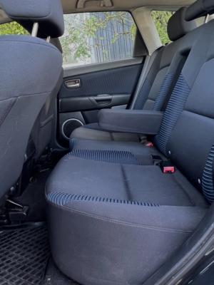 Black Mazda 3 2005 in Riga, with an engine capacity of 1.60 L and mileage of 291 thousand km for 1650 €, photo 8 on AUTOMOTO.COM.LV