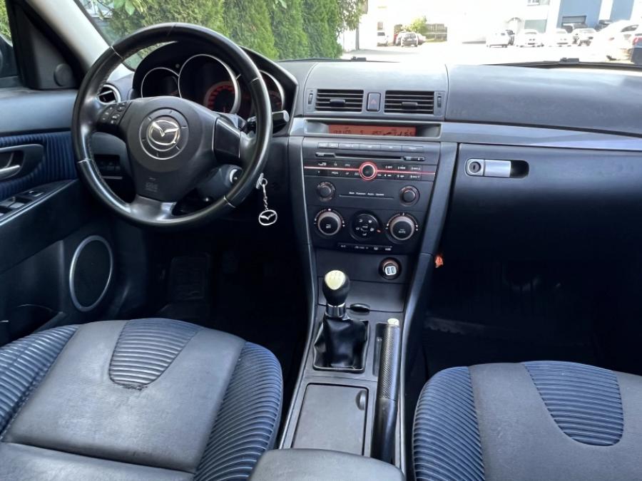 Black Mazda 3 2005 in Riga, with an engine capacity of 1.60 L and mileage of 291 thousand km for 1650 €, photo 13 on AUTOMOTO.COM.LV