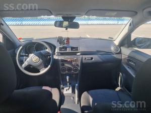 Black Mazda 3 2007 in Riga, with an engine capacity of 1.60 L and mileage of 267 thousand km for 700 €, photo 6 on AUTOMOTO.COM.LV