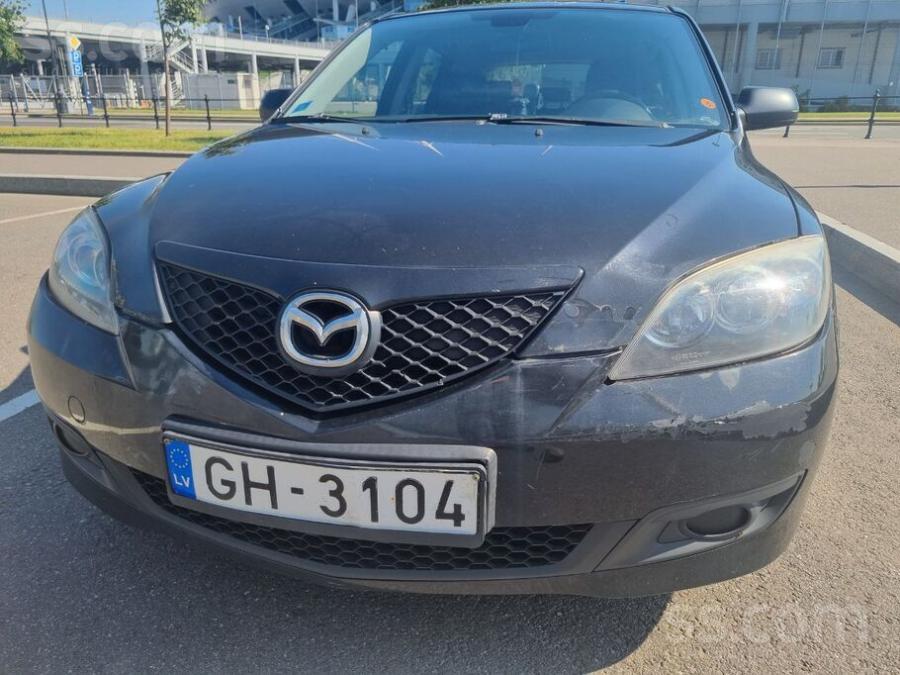 Black Mazda 3 2007 in Riga, with an engine capacity of 1.60 L and mileage of 267 thousand km for 700 €, photo 11 on AUTOMOTO.COM.LV