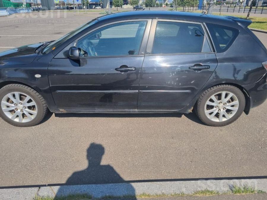 Black Mazda 3 2007 in Riga, with an engine capacity of 1.60 L and mileage of 267 thousand km for 700 €, photo 12 on AUTOMOTO.COM.LV