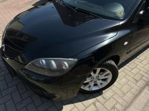 Black Mazda 3 2007 in Riga, with an engine capacity of 1.60 L and mileage of 230 thousand km for 990 €, photo 3 on AUTOMOTO.COM.LV