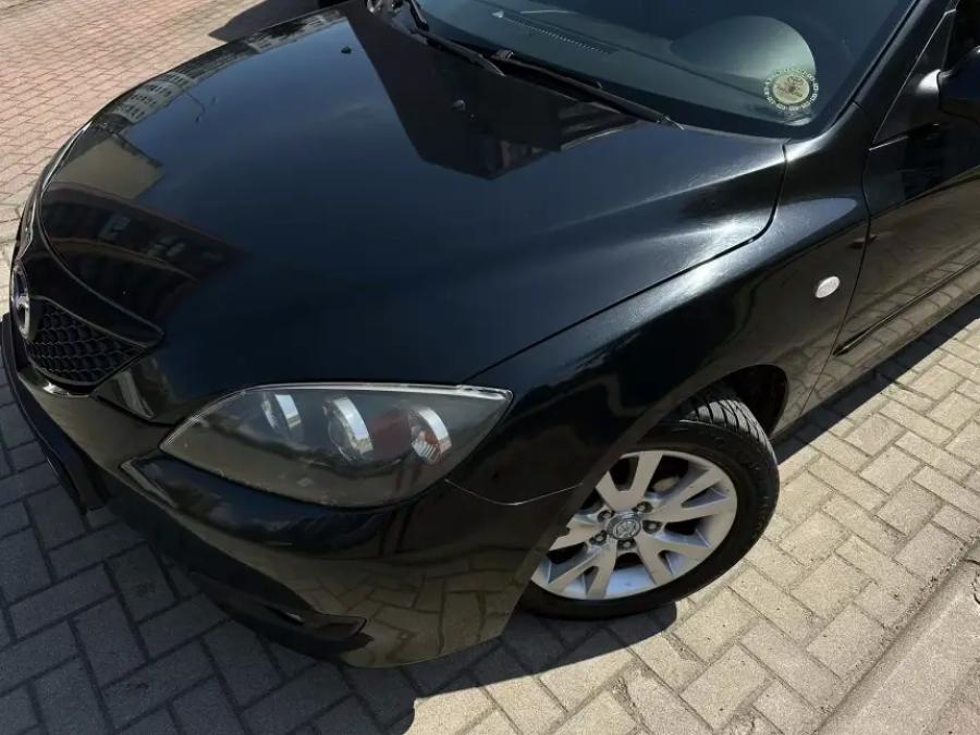 Black Mazda 3 2007 in Riga, with an engine capacity of 1.60 L and mileage of 230 thousand km for 990 €, photo 3 on AUTOMOTO.COM.LV