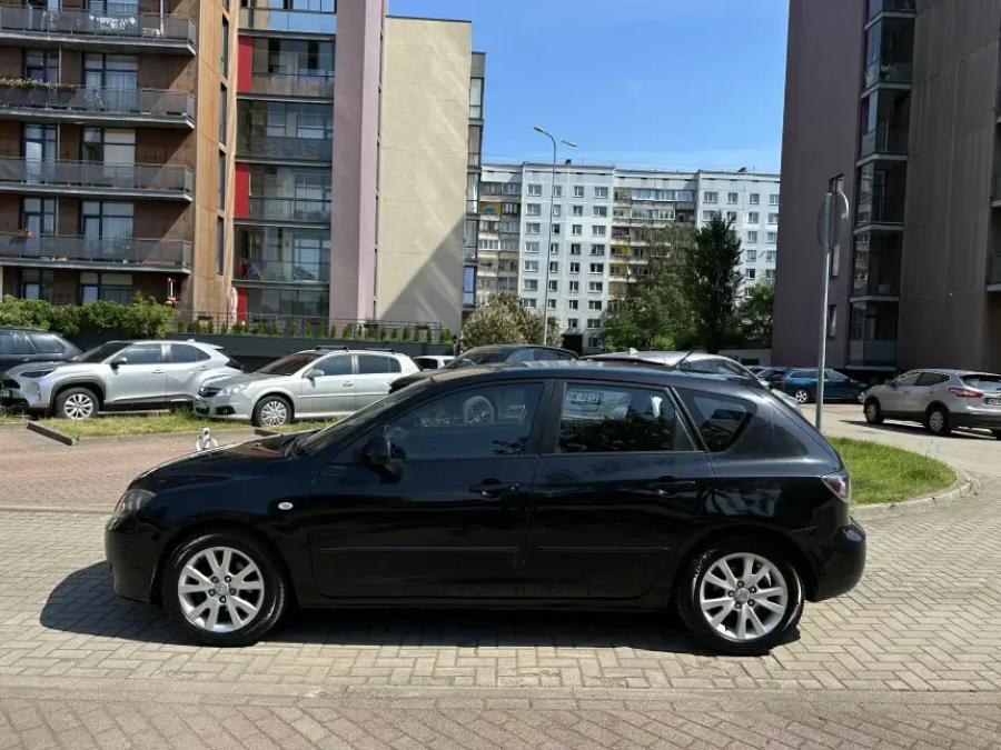 Black Mazda 3 2007 in Riga, with an engine capacity of 1.60 L and mileage of 230 thousand km for 990 €, photo 4 on AUTOMOTO.COM.LV