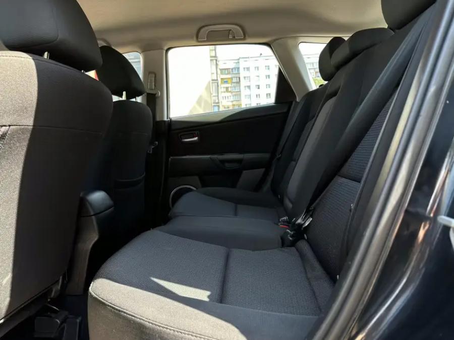 Black Mazda 3 2007 in Riga, with an engine capacity of 1.60 L and mileage of 230 thousand km for 990 €, photo 15 on AUTOMOTO.COM.LV