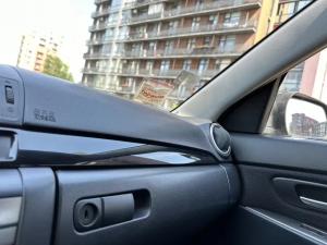 Black Mazda 3 2007 in Riga, with an engine capacity of 1.60 L and mileage of 230 thousand km for 990 €, photo 18 on AUTOMOTO.COM.LV