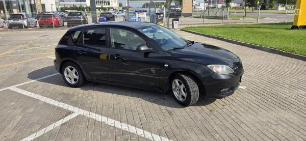 Black Mazda 3 2007 in Siauliai, with an engine capacity of 1.60 L and mileage of 163 thousand km for 750 €, photo 3 on AUTOMOTO.COM.LV