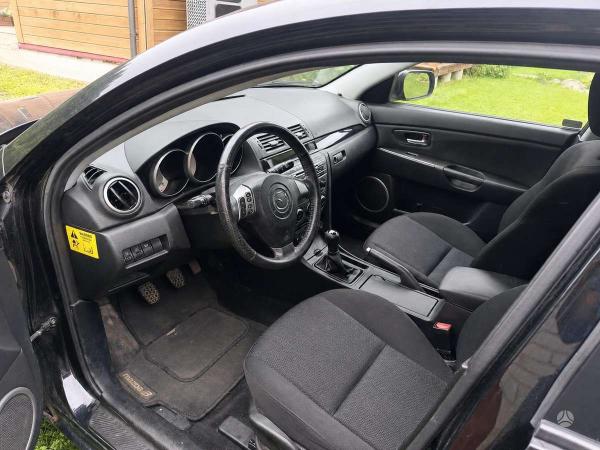 Black Mazda 3 2007 in Skuodas, with an engine capacity of 1.60 L and mileage of 136 thousand km for 1750 €, photo 5 on AUTOMOTO.COM.LV