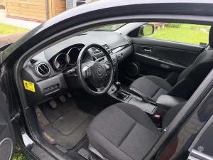 Black Mazda 3 2007 in Skuodas, with an engine capacity of 1.60 L and mileage of 136 thousand km for 1750 €, photo 6 on AUTOMOTO.COM.LV