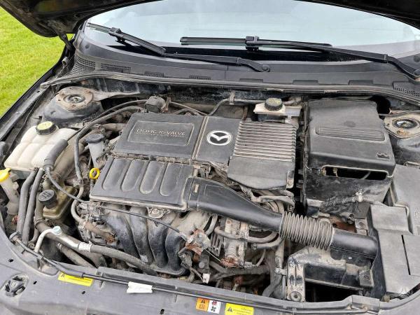 Black Mazda 3 2007 in Skuodas, with an engine capacity of 1.60 L and mileage of 136 thousand km for 1750 €, photo 8 on AUTOMOTO.COM.LV