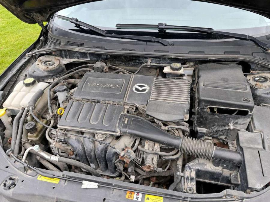 Black Mazda 3 2007 in Skuodas, with an engine capacity of 1.60 L and mileage of 136 thousand km for 1750 €, photo 9 on AUTOMOTO.COM.LV