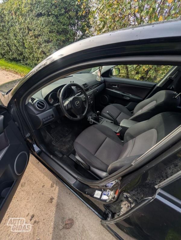 Black Mazda 3 2007 in Kretinga, with an engine capacity of 1.60 L and mileage of 225 thousand km for 2200 €, photo 11 on AUTOMOTO.COM.LV