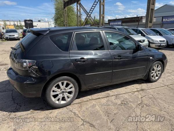 Black Mazda 3 2008 in Tallinn, with an engine capacity of 1.60 L and mileage of 253 thousand km for 799 €, photo 3 on AUTOMOTO.COM.LV