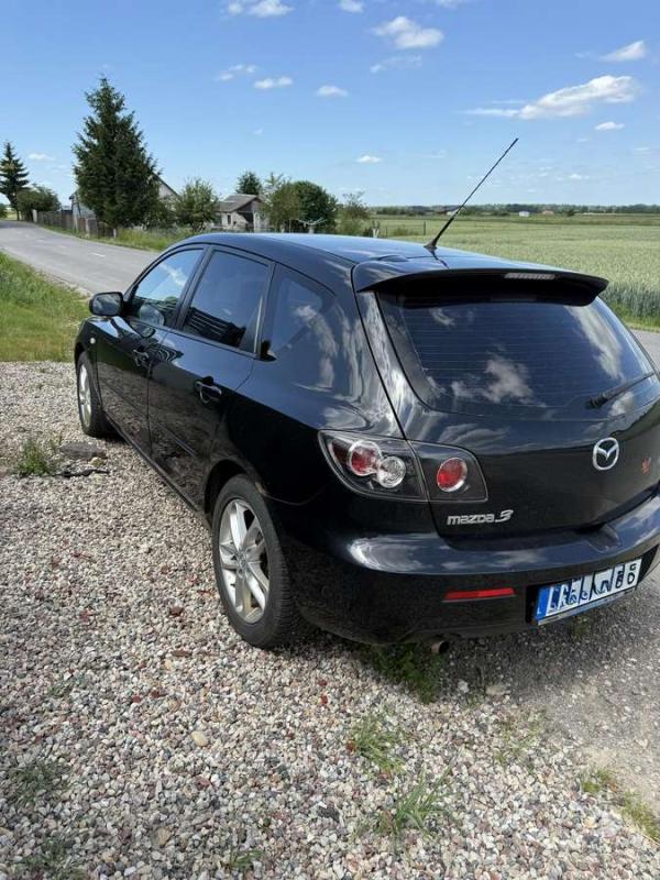 Black Mazda 3 2008 in Kaunas, with an engine capacity of 1.60 L and mileage of 299 thousand km for 950 €, photo 6 on AUTOMOTO.COM.LV