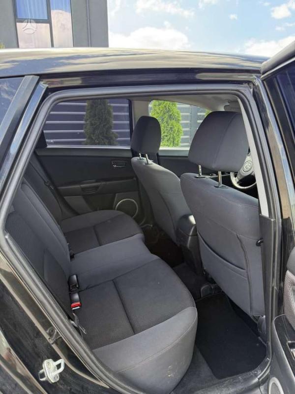 Black Mazda 3 2008 in Kaunas, with an engine capacity of 1.60 L and mileage of 299 thousand km for 950 €, photo 10 on AUTOMOTO.COM.LV
