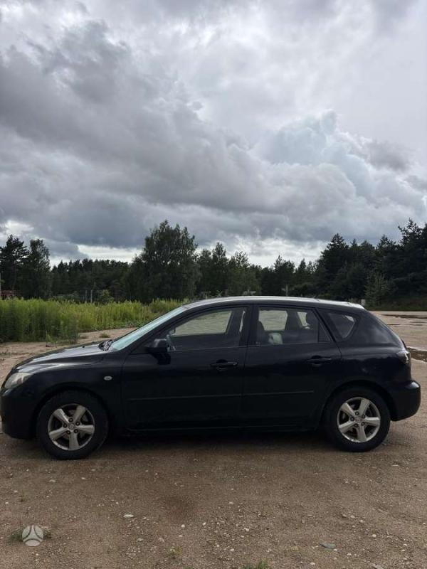 Black Mazda 3 2008 in Vilnius, with an engine capacity of 1.56 L and mileage of 279 thousand km for 900 €, photo 2 on AUTOMOTO.COM.LV