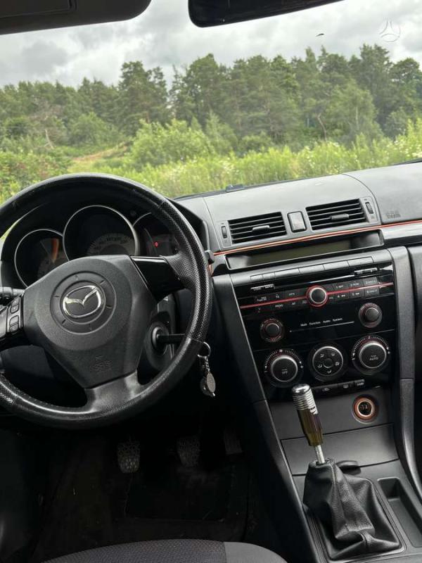 Black Mazda 3 2008 in Vilnius, with an engine capacity of 1.56 L and mileage of 279 thousand km for 900 €, photo 10 on AUTOMOTO.COM.LV