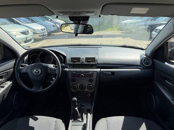 Black Mazda 3 2008 in Tallinn, with an engine capacity of 1.60 L and mileage of 253 thousand km for 699 €, photo 5 on AUTOMOTO.COM.LV