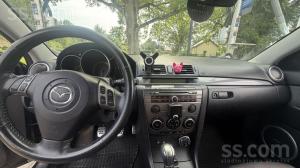 Black Mazda 3 2008 in Riga, with an engine capacity of 2.00 L and mileage of 267 thousand km for 2300 €, photo 3 on AUTOMOTO.COM.LV