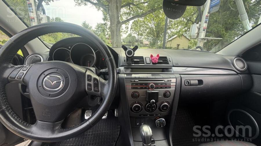 Black Mazda 3 2008 in Riga, with an engine capacity of 2.00 L and mileage of 267 thousand km for 2300 €, photo 3 on AUTOMOTO.COM.LV