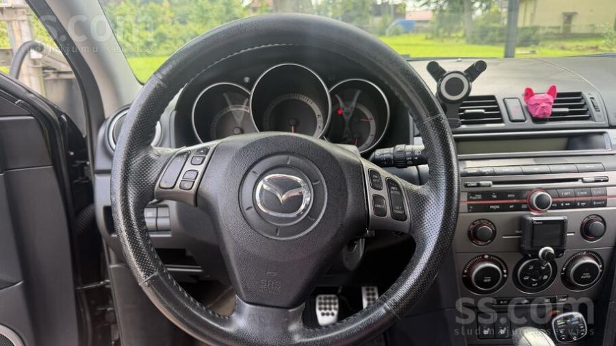 Black Mazda 3 2008 in Riga, with an engine capacity of 2.00 L and mileage of 267 thousand km for 2300 €, photo 4 on AUTOMOTO.COM.LV