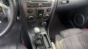 Black Mazda 3 2008 in Riga, with an engine capacity of 2.00 L and mileage of 267 thousand km for 2300 €, photo 5 on AUTOMOTO.COM.LV