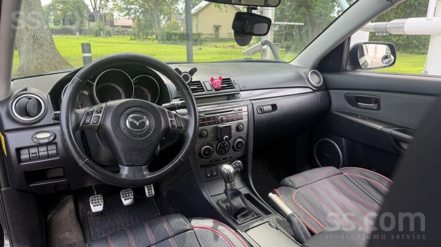 Black Mazda 3 2008 in Riga, with an engine capacity of 2.00 L and mileage of 267 thousand km for 2300 €, photo 7 on AUTOMOTO.COM.LV