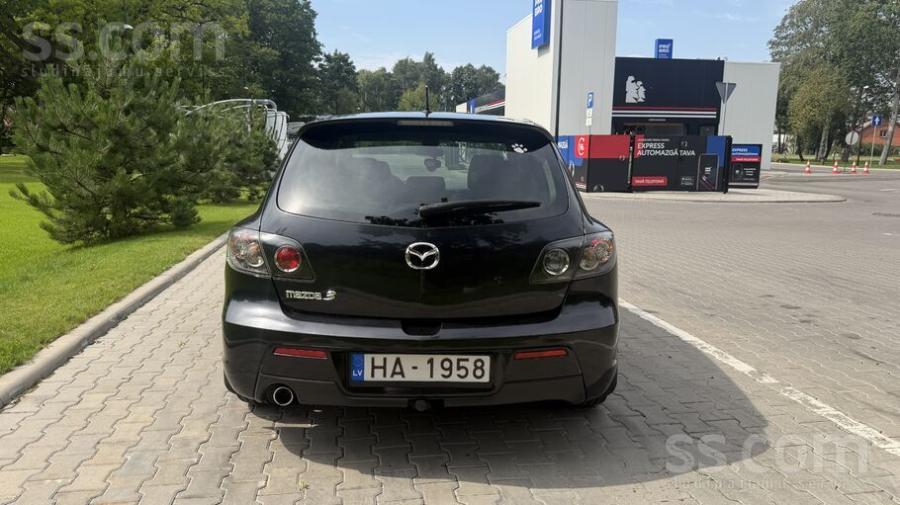 Black Mazda 3 2008 in Riga, with an engine capacity of 2.00 L and mileage of 267 thousand km for 2300 €, photo 14 on AUTOMOTO.COM.LV