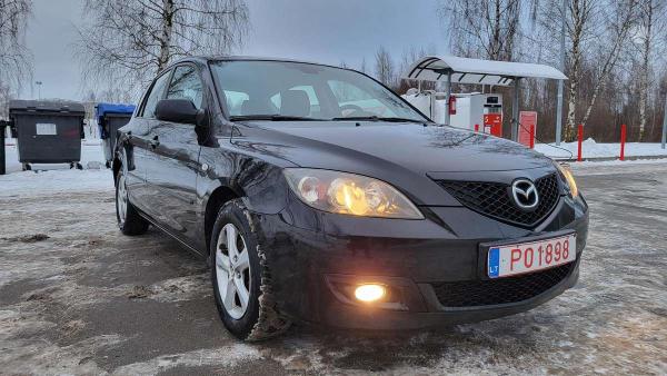 Black Mazda 3 2009 in Siauliai, with an engine capacity of 1.56 L and mileage of 233 thousand km for 2149 €, photo 1 on AUTOMOTO.COM.LV