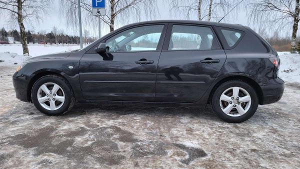 Black Mazda 3 2009 in Siauliai, with an engine capacity of 1.56 L and mileage of 233 thousand km for 2149 €, photo 5 on AUTOMOTO.COM.LV