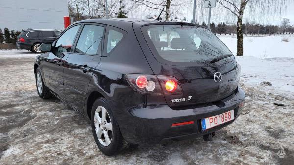 Black Mazda 3 2009 in Siauliai, with an engine capacity of 1.56 L and mileage of 233 thousand km for 2149 €, photo 6 on AUTOMOTO.COM.LV