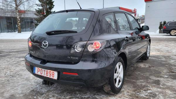 Black Mazda 3 2009 in Siauliai, with an engine capacity of 1.56 L and mileage of 233 thousand km for 2149 €, photo 8 on AUTOMOTO.COM.LV