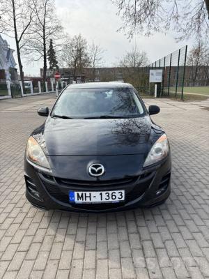 Black Mazda 3 2009 in Daugavpils, with an engine capacity of 2.20 L and mileage of 187 thousand km for 2000 €, photo 4 on AUTOMOTO.COM.LV