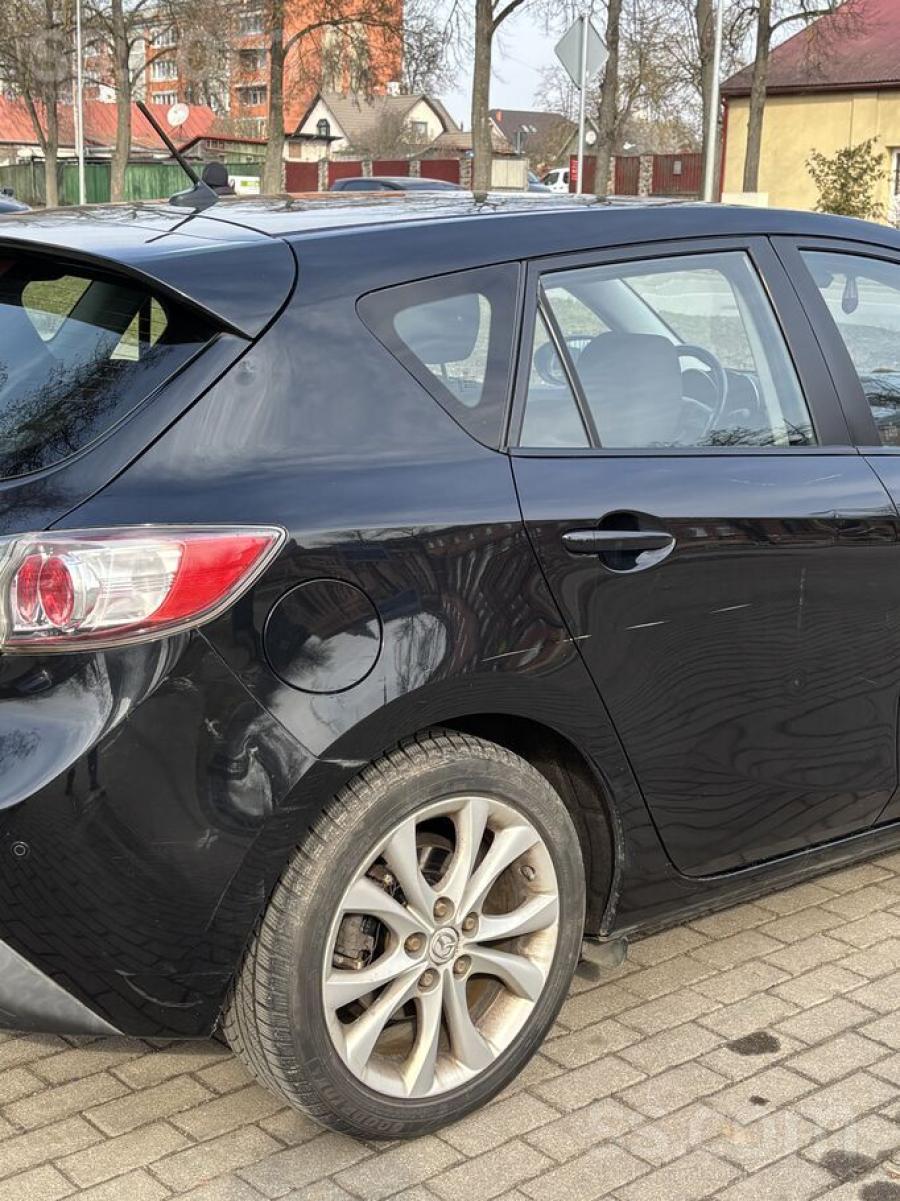 Black Mazda 3 2009 in Daugavpils, with an engine capacity of 2.20 L and mileage of 187 thousand km for 2000 €, photo 5 on AUTOMOTO.COM.LV