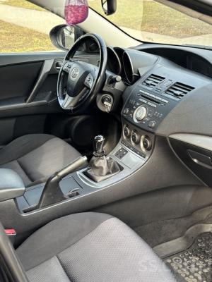 Black Mazda 3 2009 in Daugavpils, with an engine capacity of 2.20 L and mileage of 187 thousand km for 2000 €, photo 7 on AUTOMOTO.COM.LV