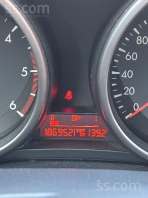 Black Mazda 3 2009 in Daugavpils, with an engine capacity of 2.20 L and mileage of 187 thousand km for 2000 €, photo 8 on AUTOMOTO.COM.LV