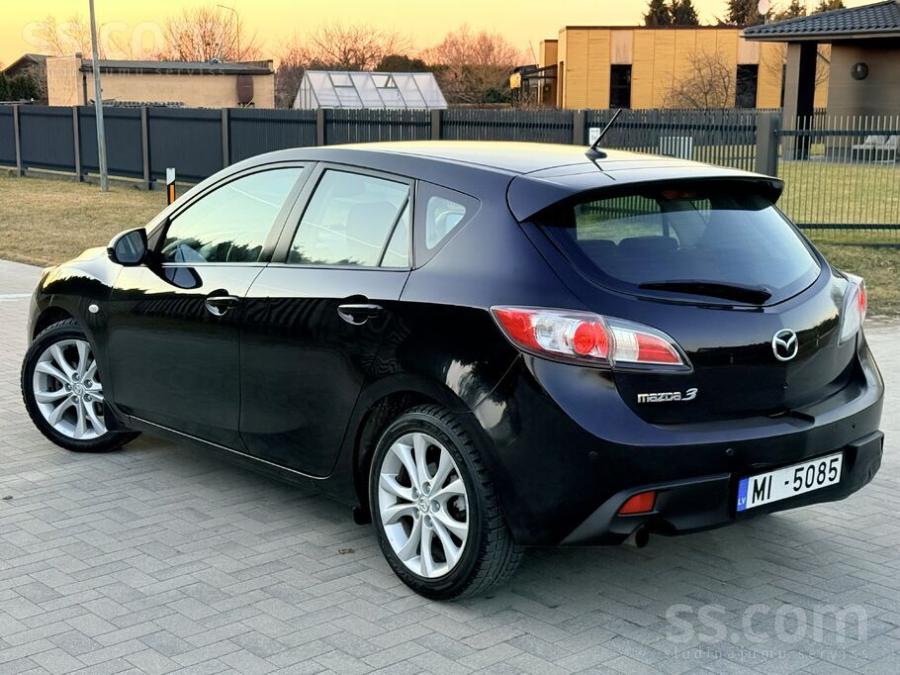 Black Mazda 3 2010 in Riga, with an engine capacity of 1.60 L and mileage of 292 thousand km for 2050 €, photo 6 on AUTOMOTO.COM.LV