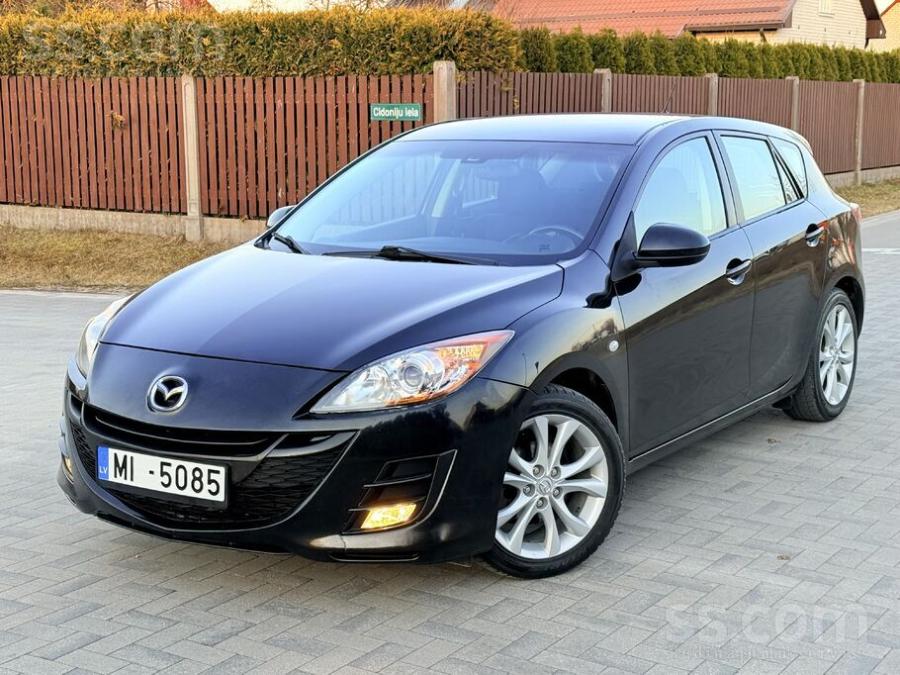 Black Mazda 3 2010 in Riga, with an engine capacity of 1.60 L and mileage of 292 thousand km for 2050 €, photo 8 on AUTOMOTO.COM.LV