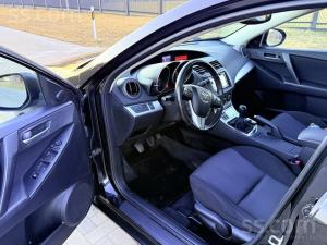 Black Mazda 3 2010 in Riga, with an engine capacity of 1.60 L and mileage of 292 thousand km for 2050 €, photo 9 on AUTOMOTO.COM.LV
