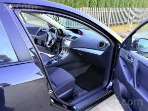 Black Mazda 3 2010 in Riga, with an engine capacity of 1.60 L and mileage of 292 thousand km for 2050 €, photo 12 on AUTOMOTO.COM.LV