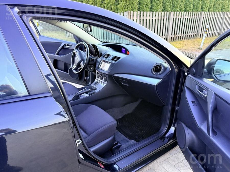 Black Mazda 3 2010 in Riga, with an engine capacity of 1.60 L and mileage of 292 thousand km for 2050 €, photo 12 on AUTOMOTO.COM.LV