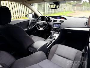 Black Mazda 3 2010 in Riga, with an engine capacity of 1.60 L and mileage of 292 thousand km for 2050 €, photo 14 on AUTOMOTO.COM.LV