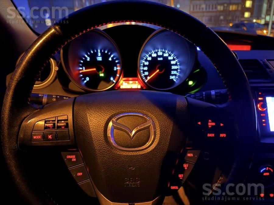 Black Mazda 3 2010 in Riga, with an engine capacity of 1.60 L and mileage of 292 thousand km for 2050 €, photo 24 on AUTOMOTO.COM.LV