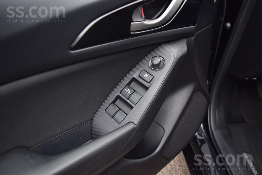 Black Mazda 3 2015 in Riga, with an engine capacity of 2.00 L and mileage of 130 thousand km for 7500 €, photo 9 on AUTOMOTO.COM.LV