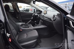 Black Mazda 3 2015 in Riga, with an engine capacity of 2.00 L and mileage of 130 thousand km for 7500 €, photo 13 on AUTOMOTO.COM.LV