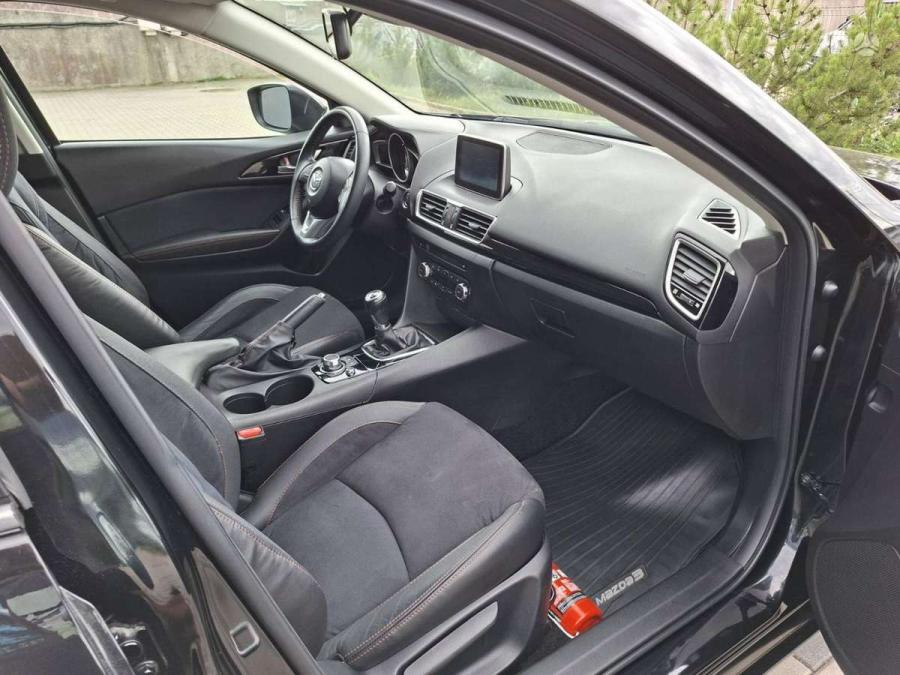Black Mazda 3 2016 in Siauliai, with an engine capacity of 1.50 L and mileage of 102 thousand km for 6990 €, photo 14 on AUTOMOTO.COM.LV