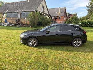 Black Mazda 3 2018 in Riga, with an engine capacity of 2.00 L and mileage of 133 thousand km for 10500 €, photo 4 on AUTOMOTO.COM.LV