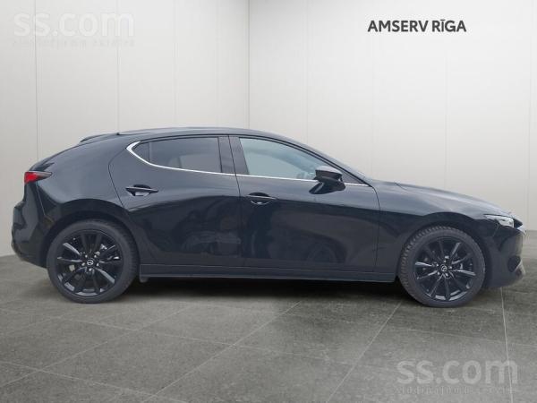 Black Mazda 3 2025 in Riga, with an engine capacity of 2.50 L and mileage of 8 thousand km for 23800 €, photo 6 on AUTOMOTO.COM.LV