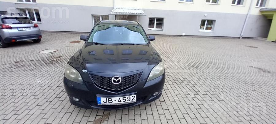 Black Mazda 3 2005 in Riga, with an engine capacity of 1.90 L and mileage of 330 thousand km for 400 €, photo 1 on AUTOMOTO.COM.LV