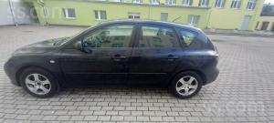 Black Mazda 3 2005 in Riga, with an engine capacity of 1.90 L and mileage of 330 thousand km for 400 €, photo 4 on AUTOMOTO.COM.LV